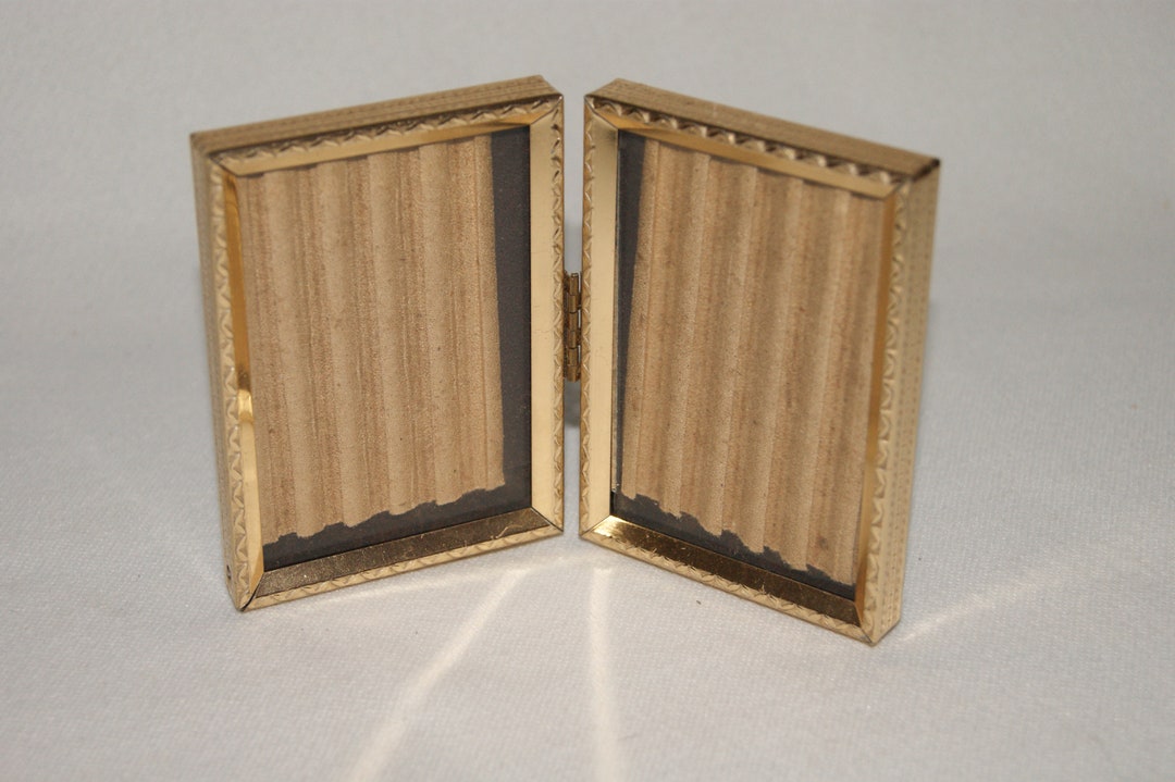 Vtg Embossed Metal Hinged Bifold Frame Holds 2 1/2 X3 1/2 Photos Orig ...