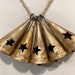 STAR BELLS - Group of Rustic Gold Cone-shaped Bells With Star Cut-outs ...