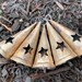 STAR BELLS - Group of Rustic Gold Cone-shaped Bells With Star Cut-outs ...