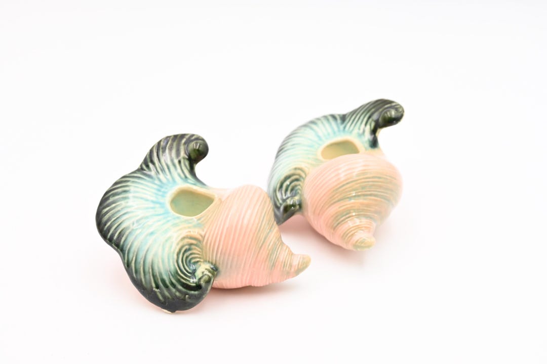2 Vintage Conch Shell Shaped Pottery Candle Holders Sitting on Green ...