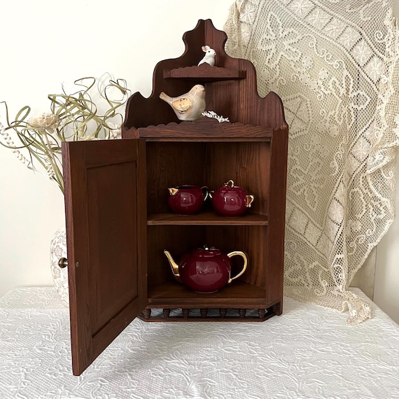 Hanging corner curio cabinet store