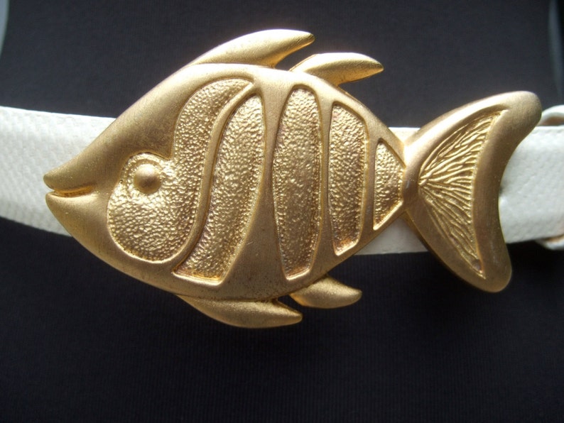 Gold Metal Fish Buckle With White Embossed Leather Belt Designed by ...