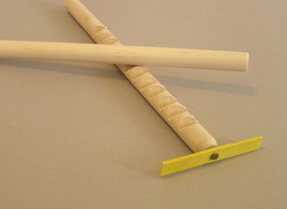 Wooden Wheel And Stick Toy