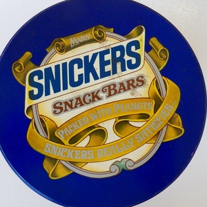 1980's VINTAGE SNICKERS TIN 7 and 1/2" Tall and 5 and 3/4" in Diameter ...