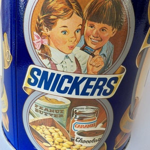 1980's VINTAGE SNICKERS TIN 7 and 1/2" Tall and 5 and 3/4" in Diameter ...