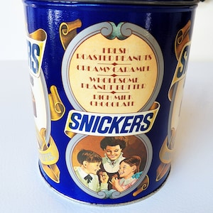 1980's VINTAGE SNICKERS TIN 7 and 1/2" Tall and 5 and 3/4" in Diameter ...