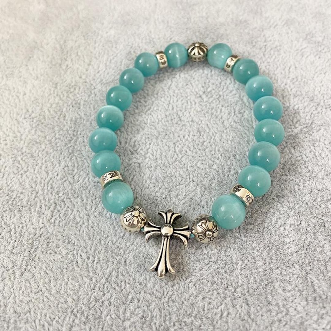 Sky Blue Cat's Eye Cross Charm Bracelet – Tranquility, Peace ...