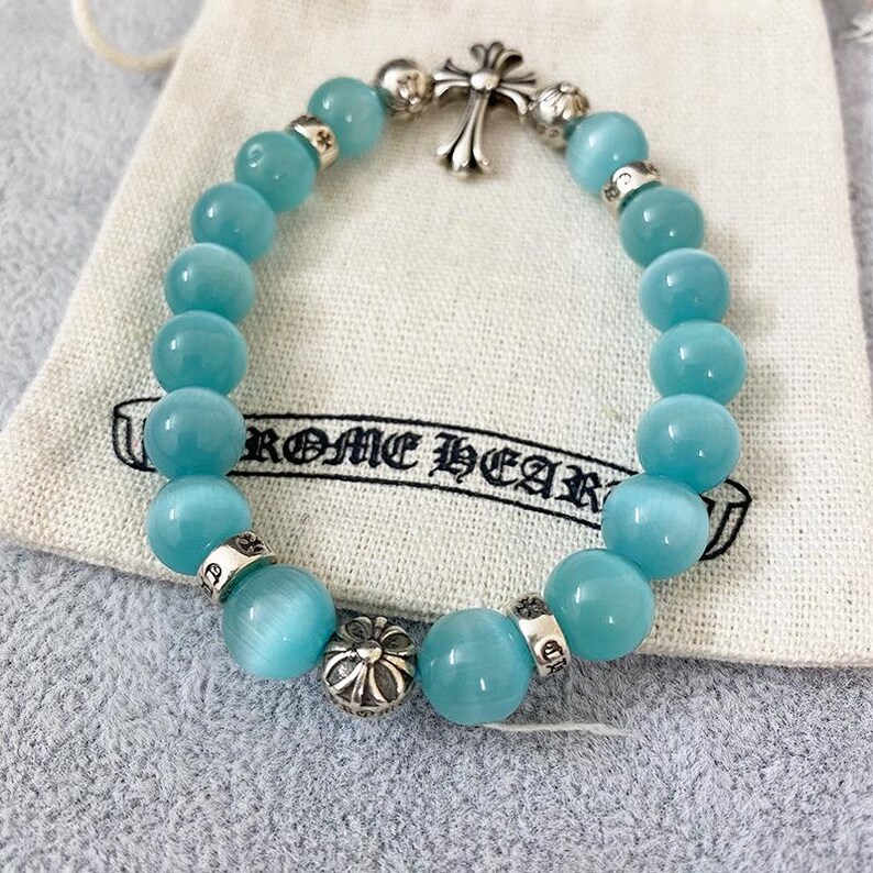 Sky Blue Cat's Eye Cross Charm Bracelet – Tranquility, Peace ...