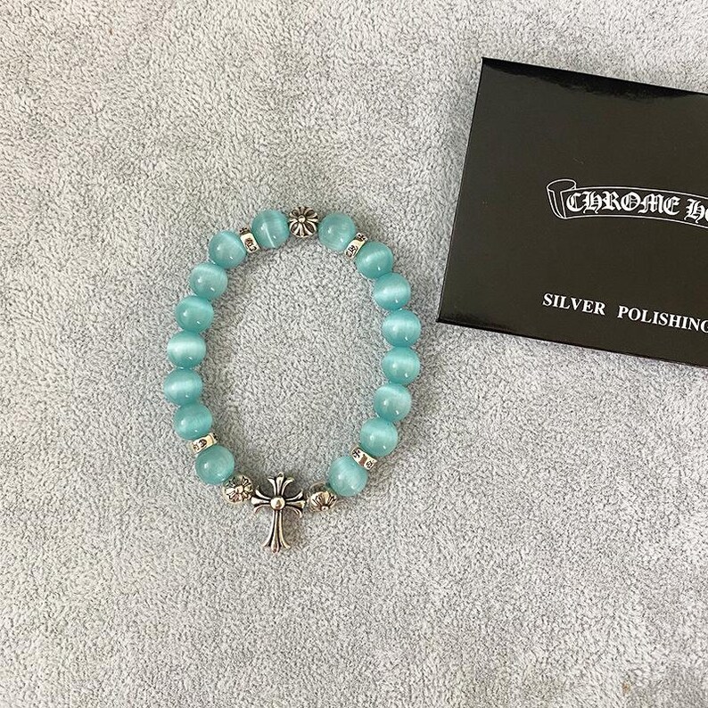 Sky Blue Cat's Eye Cross Charm Bracelet – Tranquility, Peace ...