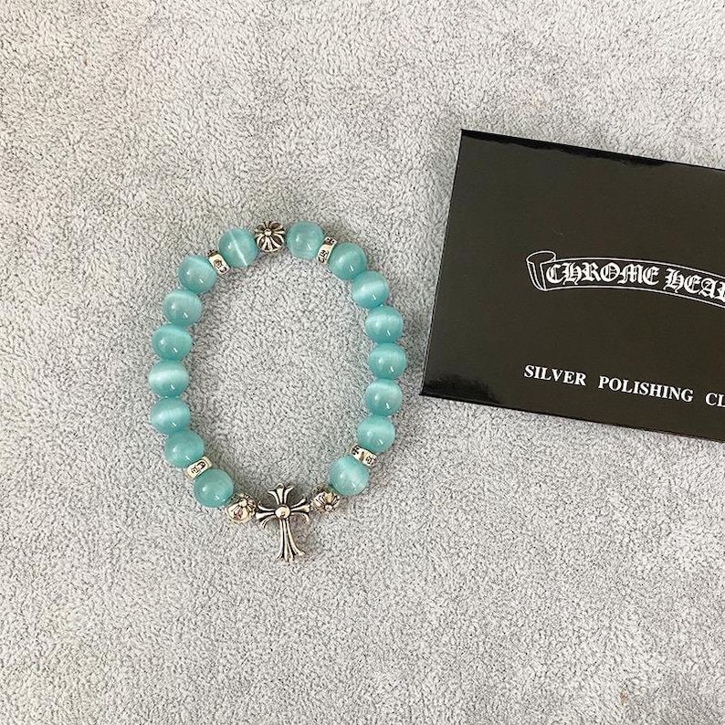 Sky Blue Cat's Eye Cross Charm Bracelet – Tranquility, Peace ...