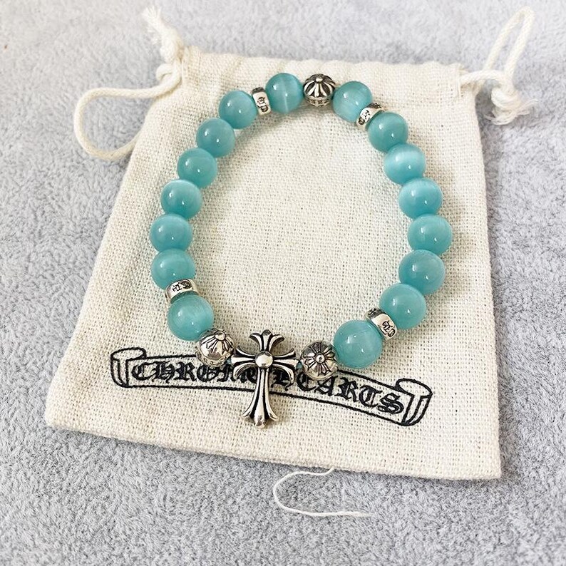 Sky Blue Cat's Eye Cross Charm Bracelet – Tranquility, Peace ...