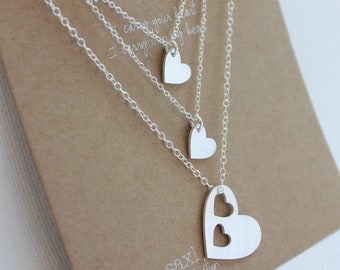 Mother and 2 daughters jewelry store
