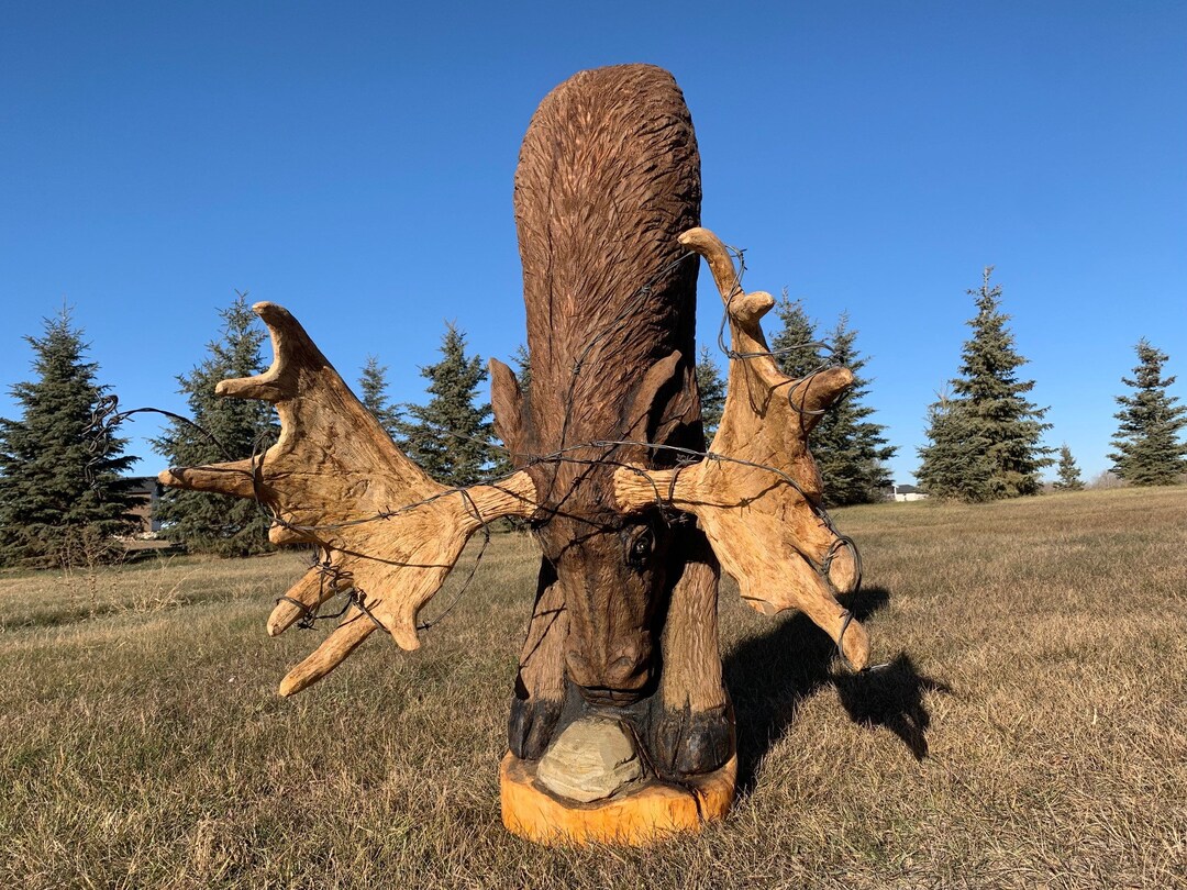 Bull Moose Chainsaw Carving With Barbed Wire Tangled in Antlers Wood ...