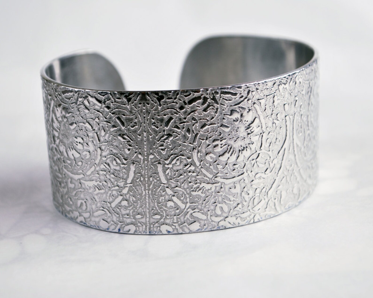 Embossed Silver aluminium cuff Floral spiral design embossed | Etsy
