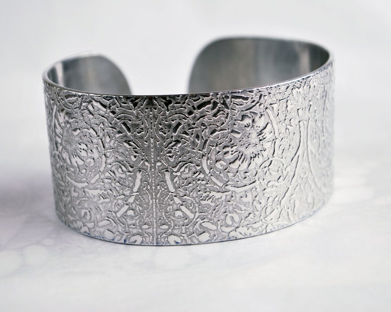 Embossed Silver aluminium cuff Floral spiral design embossed | Etsy