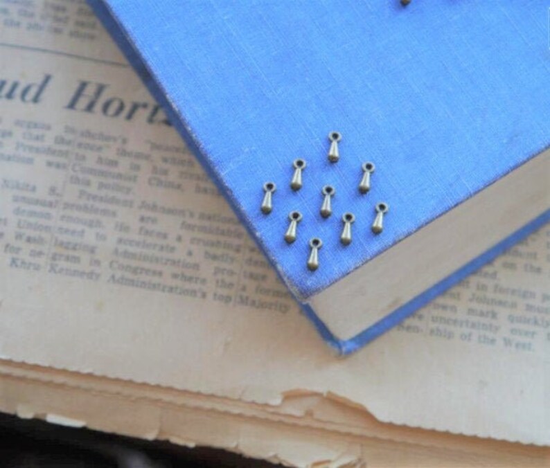 100 Pcs Antique Bronze Small Drops Necklace Ends 7mm BC1052 - Etsy