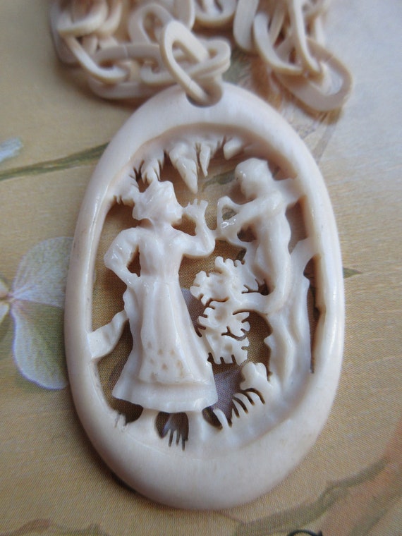 older vintage carved celluloid - Gem
