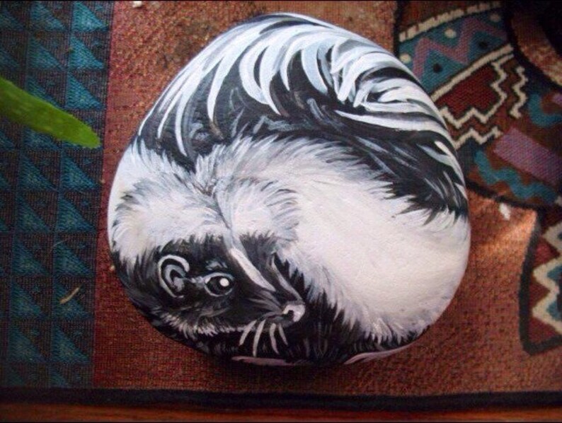 Painted Skunk Rock - Etsy