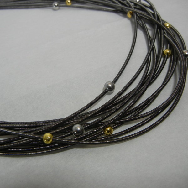 Piano Wire Necklace - Etsy