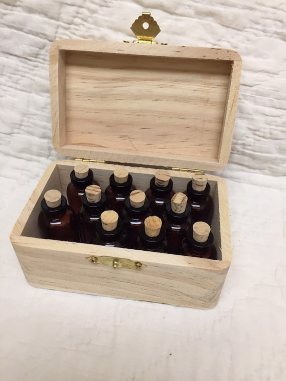 Wooden box of 11 tiny amber glass bottles for many purposes | Etsy