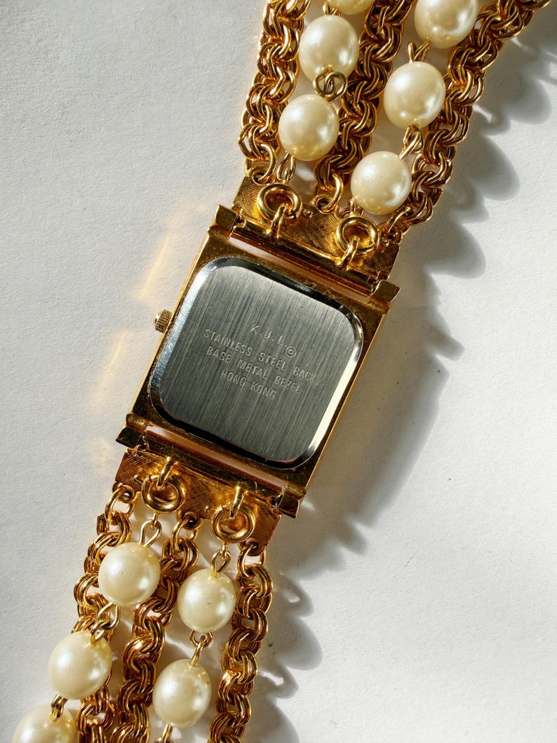 Reloj vintage KJL con cadena de perlas - Etsy España