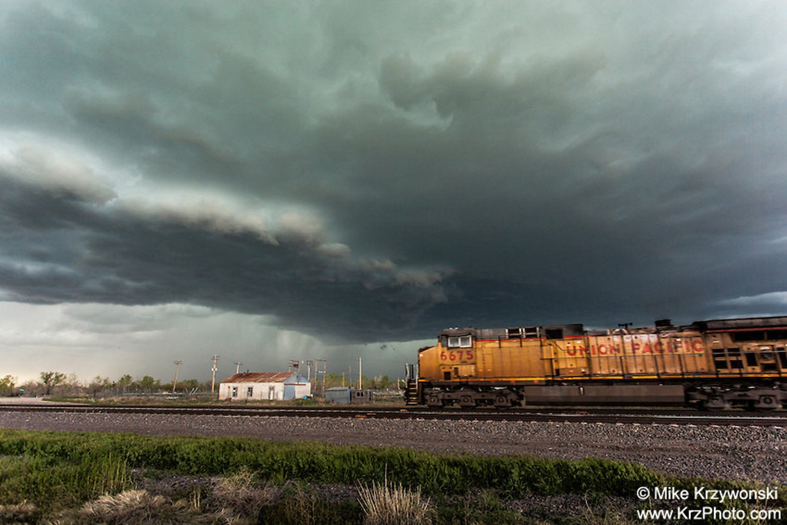 Severe Thunderstorm Above a Traveling Locomotive Train in Wyoming Photo ...
