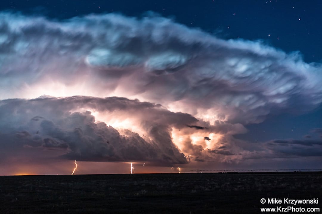 Severe Supercell Thunderstorm Illuminated by Lightning at Night in ...