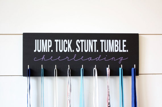 What Is A Tuck In Cheerleading
