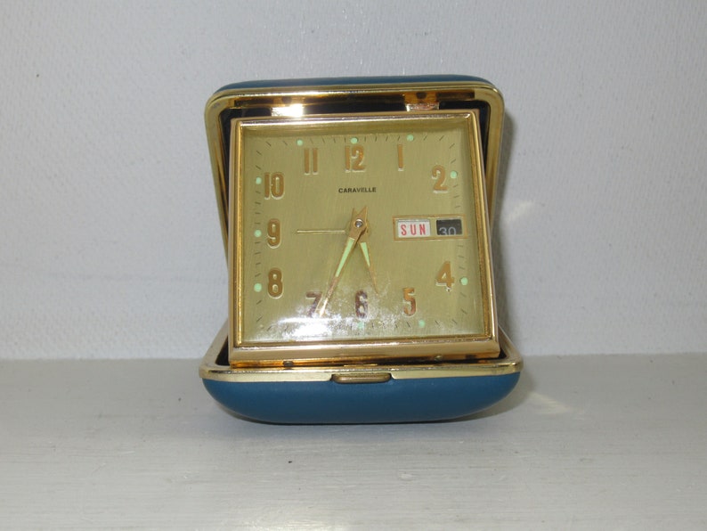 Vintage 1960 "caravelle" by Bulova Travel Day & Date Alarm Clock ...