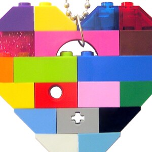 Transparent Yellow LEGO® Brick 2x2 on a Silver/gold Plated Adjustable ...