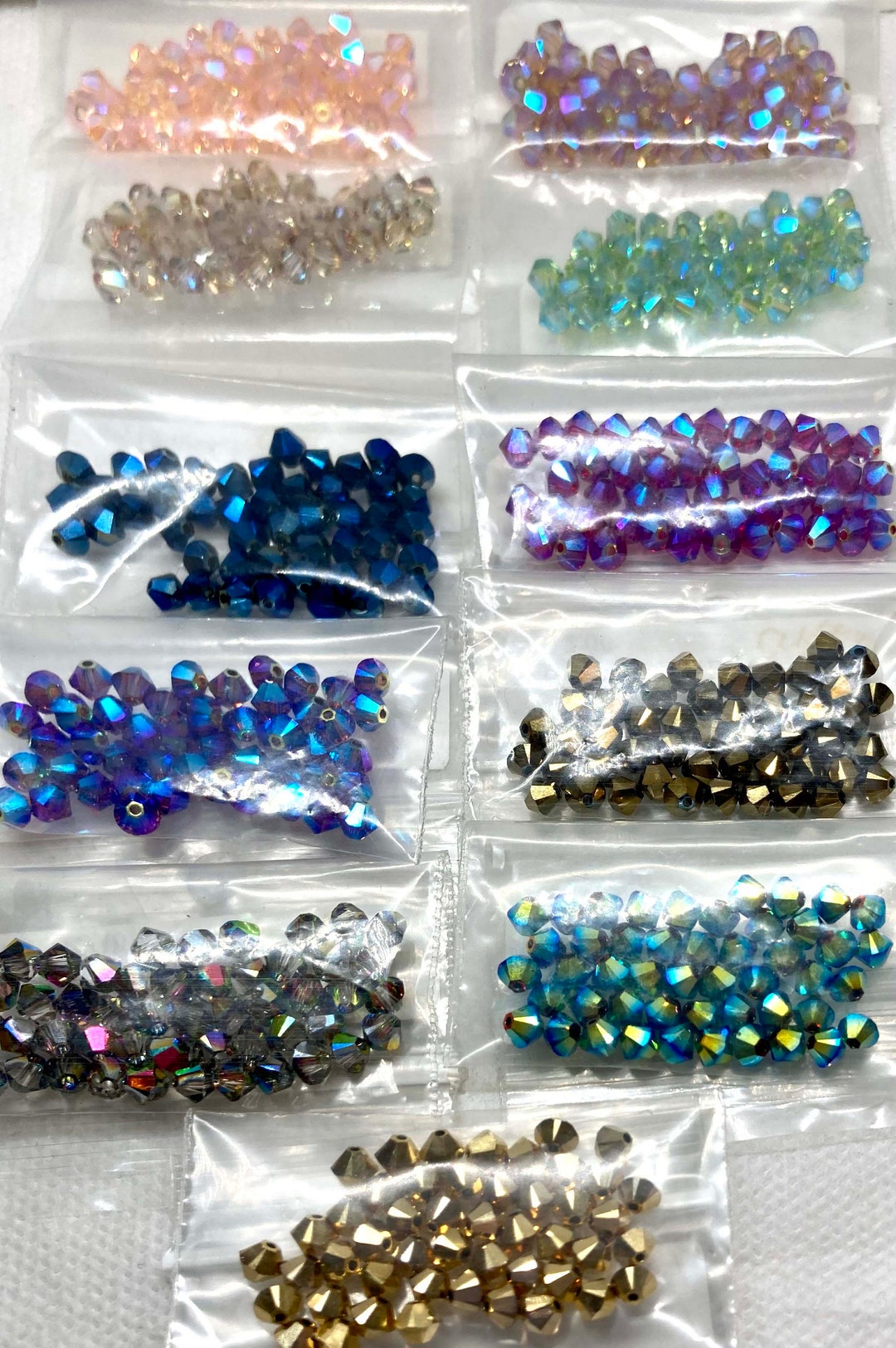 Destash Genuine Swarovski Crystals, 4 Mm Bicones 2AB & One 2X Crystals ...