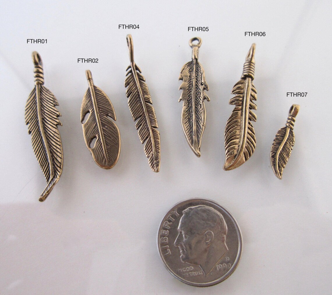 2pc Pure Bronze Feather charms oxidized finish 4mm x 21mm - Etsy España
