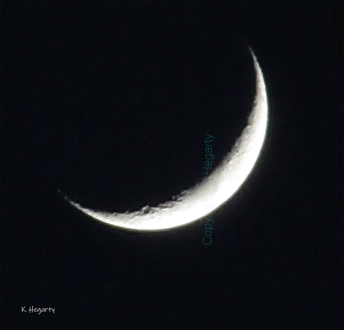 Photograph - Crescent Moon - Sharp Crescent Moon Against a Black Sky ...