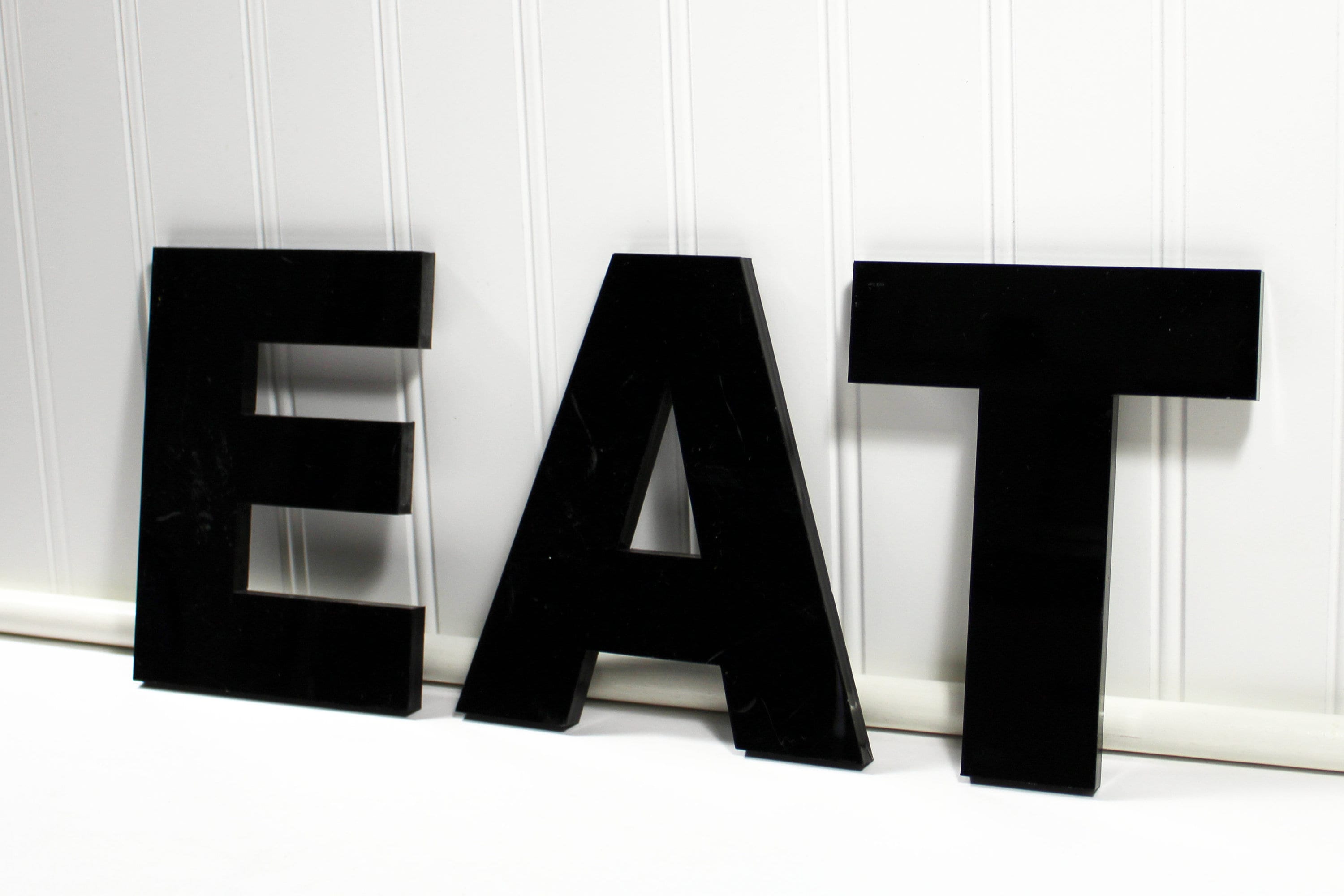 Black Eat Letters