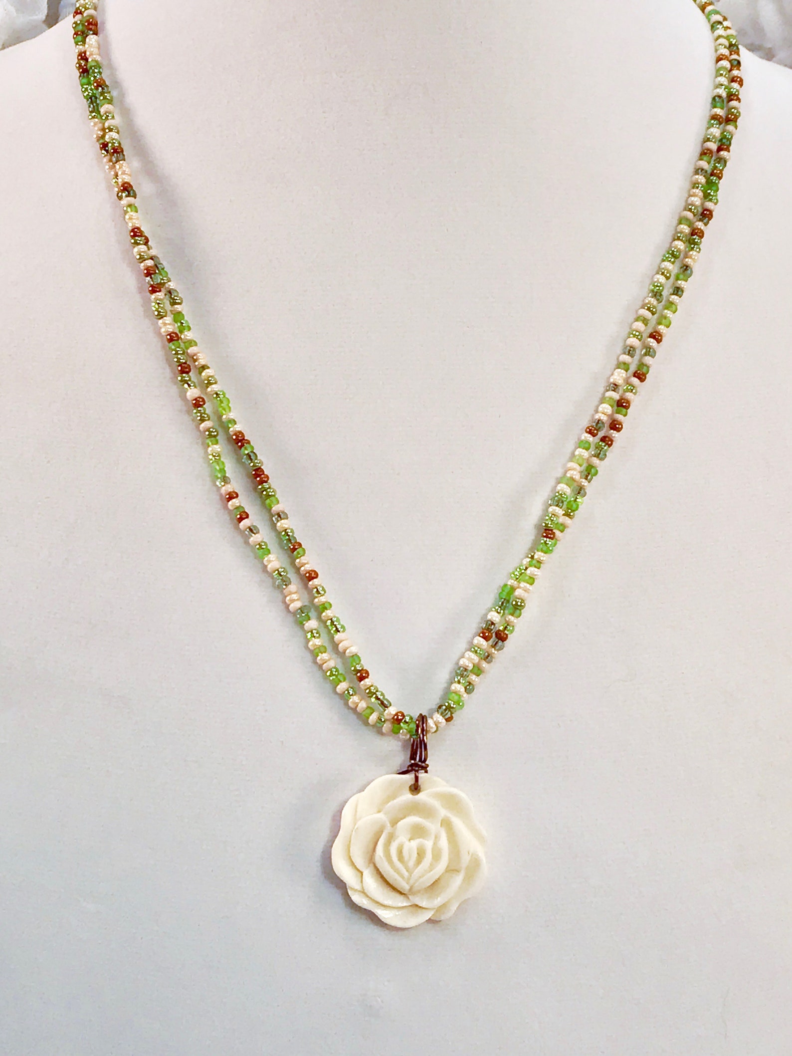 Carved Flower Pendant on Seed Bead Necklace | Etsy