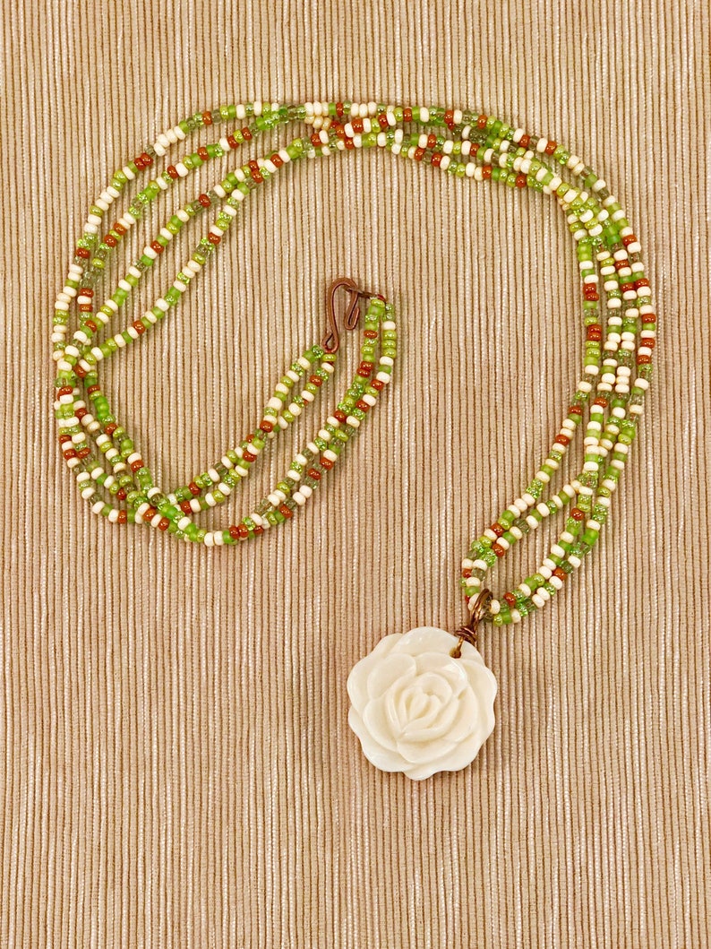 Carved Flower Pendant on Seed Bead Necklace - Etsy