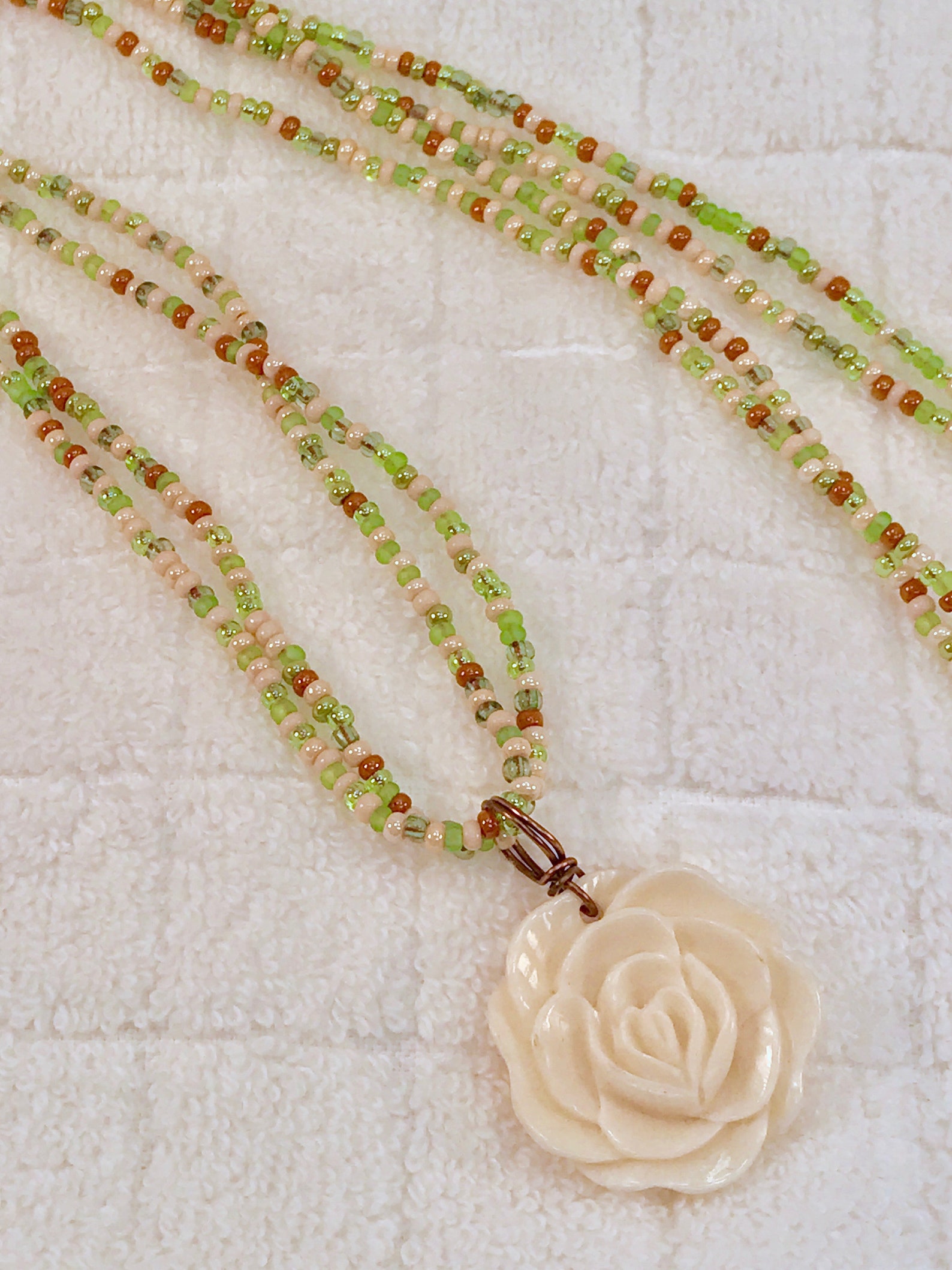 Carved Flower Pendant on Seed Bead Necklace - Etsy