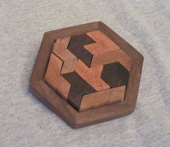 Items similar to Wooden Brain Teaser Puzzle on Etsy