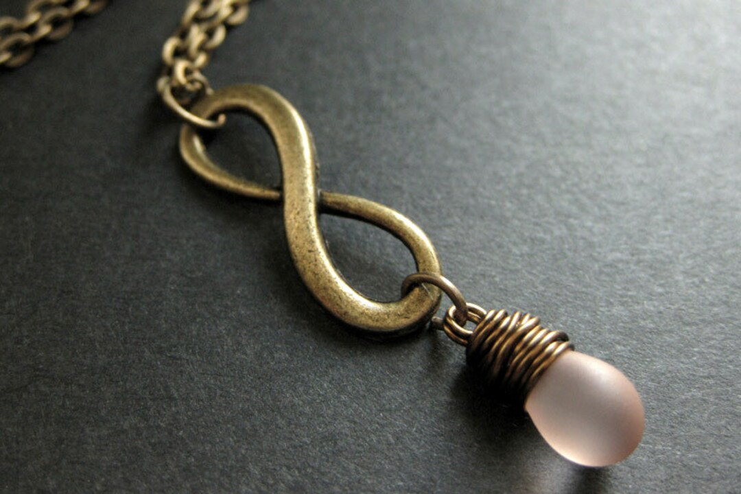 Bronze Infinity Symbol Necklace. Wire Wrapped Frosted Pink Teardrop ...