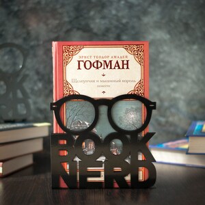 A Metal Bookend Nerd // Telling Shelf Decor for Reading Home // Back-to ...