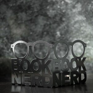A Metal Bookend Nerd // Telling Shelf Decor for Reading Home // Back-to ...