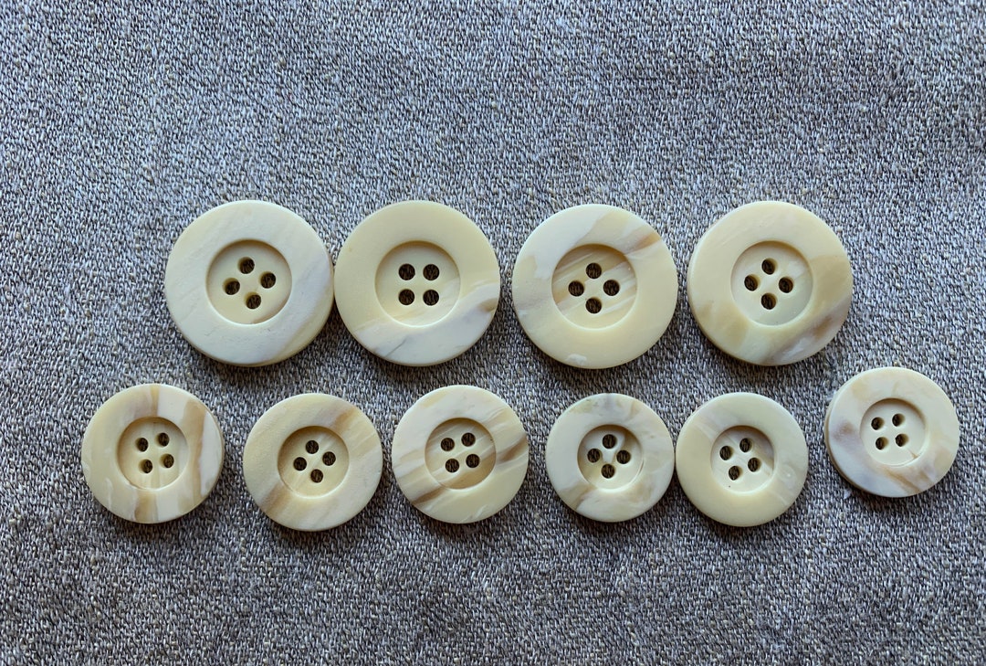 Set of Ten Cream Colored Plastic Sew Through Buttons in Two Sizes ...