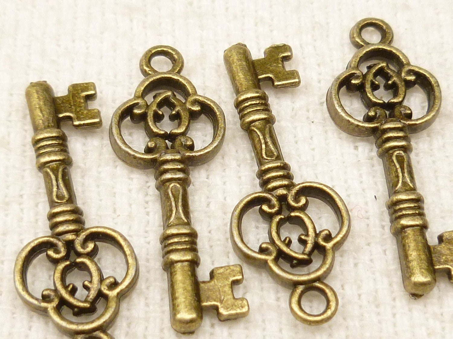 Filigree Vintage Look Small Skeleton Key Charm Bronze 6 | Etsy