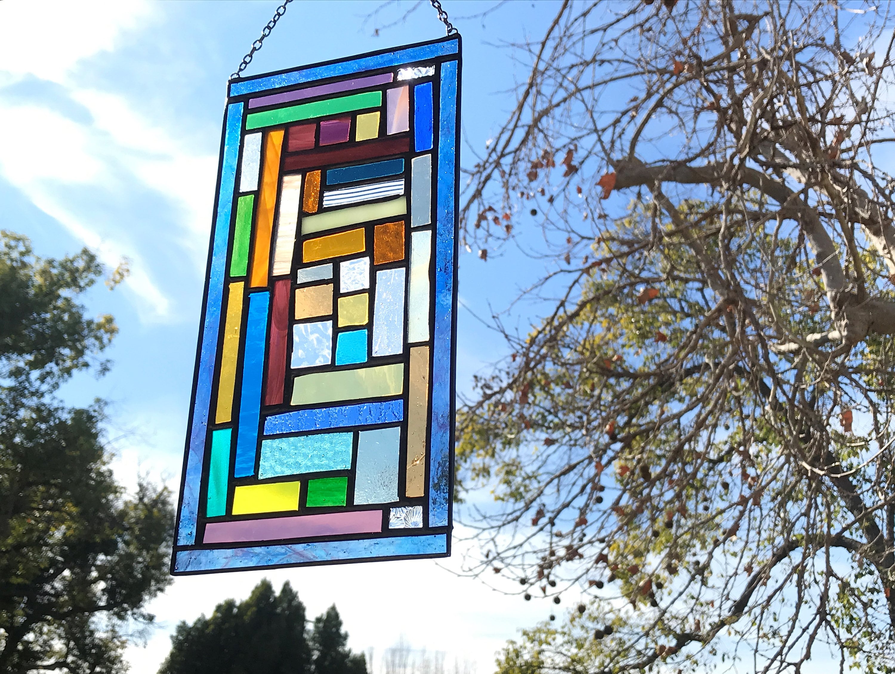 Multicolored Geometric Stained Glass Panel