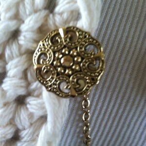 The Mattie Gold Tone Resin Medallion Sweater Clip Adds a Touch of ...