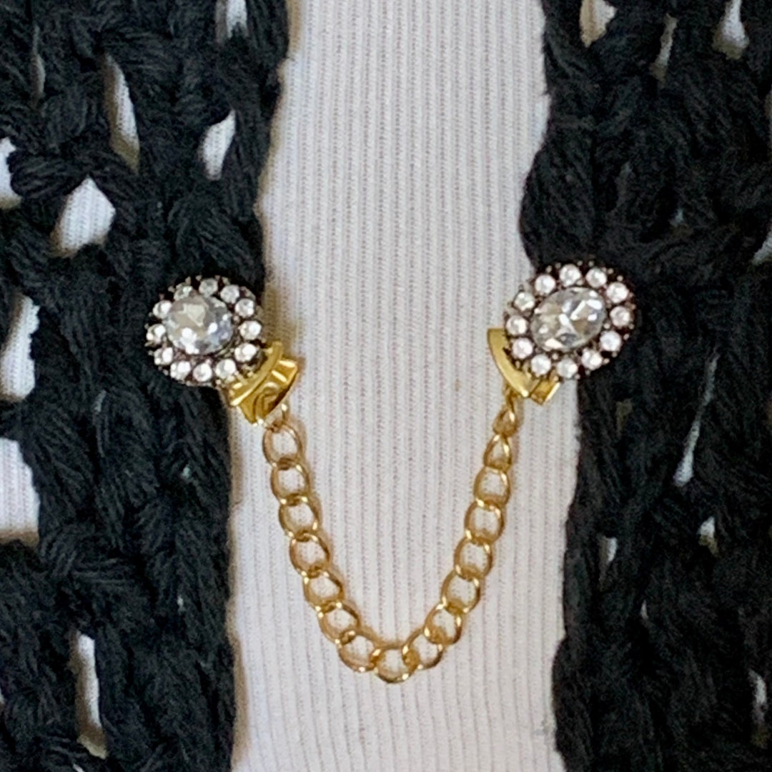 The Mattie Petite Clear Stone and Rhinestone Oval Metal Based Sweater ...