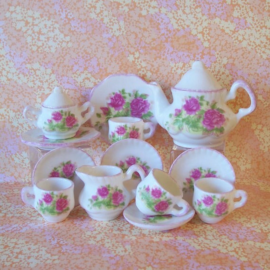 Mini Ceramic Tea Set With Pink Rose Design on White Background Fifteen ...