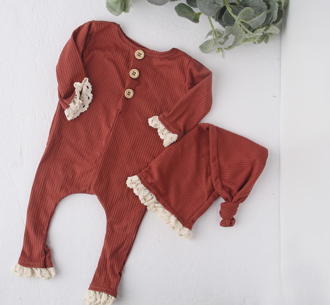 Ruffled Brick Newborn Long Sleeve Footless Romper and Sleepy Cap in a ...