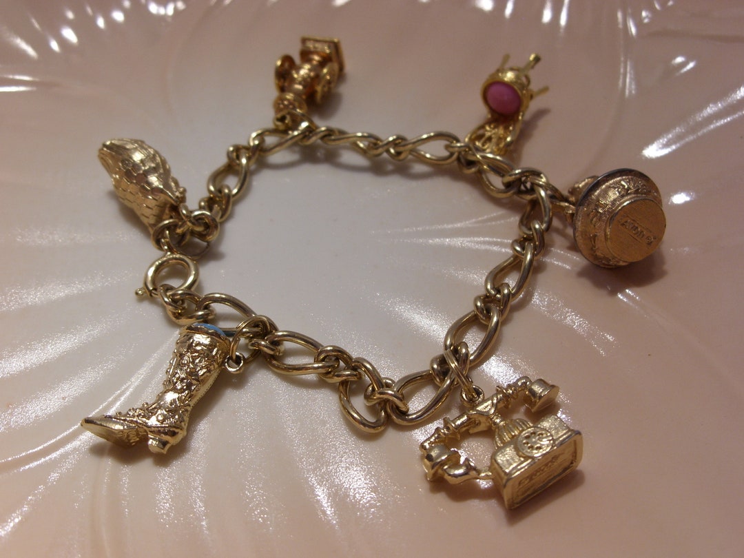 Avon Gold Tone Charm Bracelet With Six Charms Includes Owl, Telephone ...