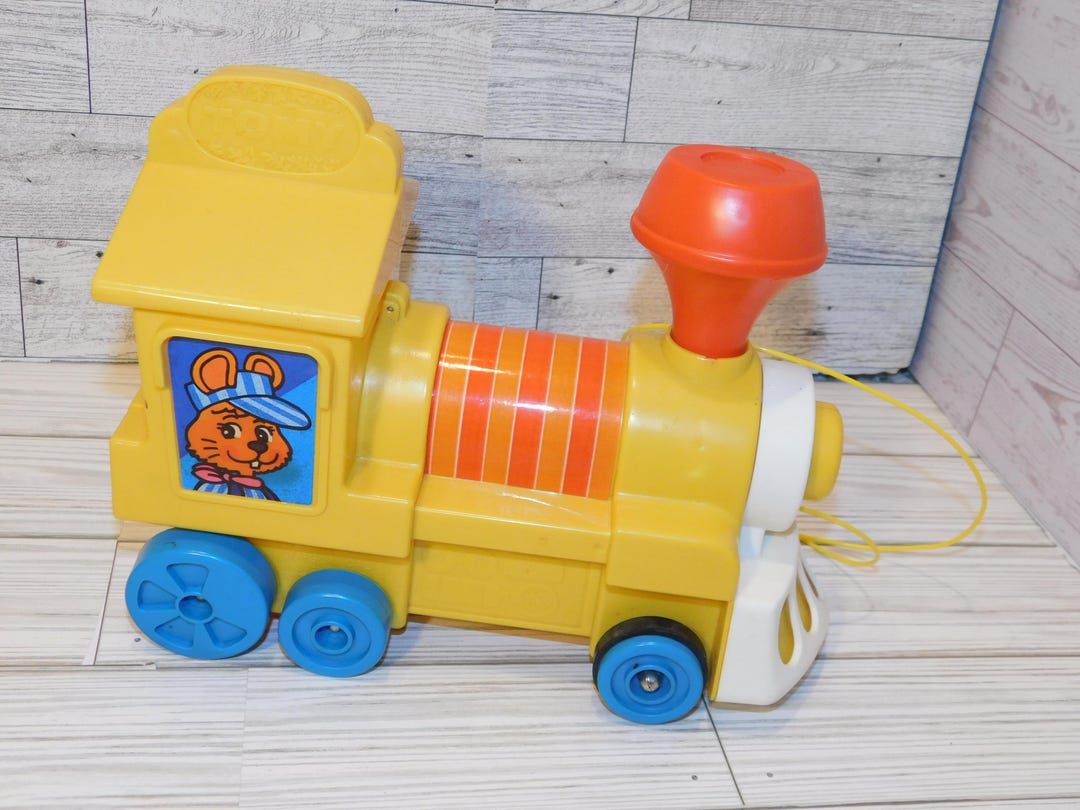 TOMY Plastic Pull Toy Extending Yellow Train Rabbit Conductor 1980 ...